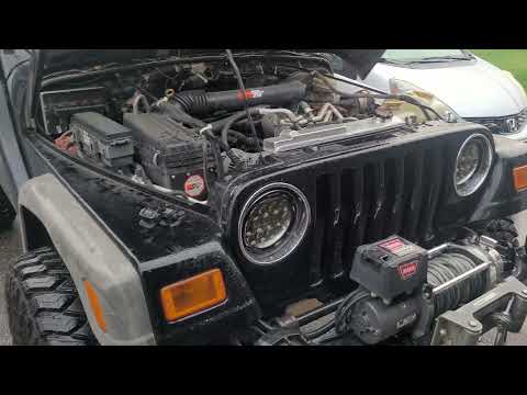 How to replace a camshaft positioning sensor in a 2005 Jeep Wrangler - TJ