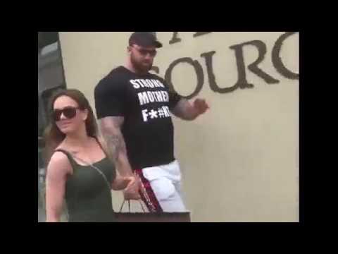 Hafthor Julius Bjornsson towers over girlfriend on shopping trip