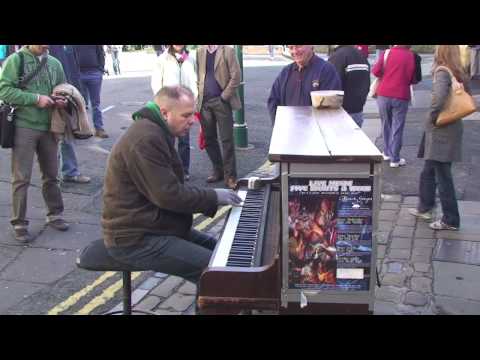 Upright piano busking – John Williamson