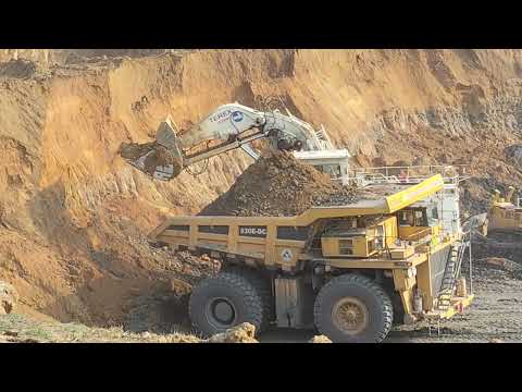 RH120E vs 830E-DC: The Ultimate Mining Machine Duo!"