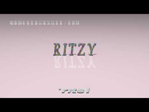 ritzy - pronunciation + Examples in sentences and phrases