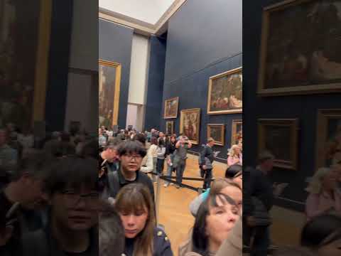 Small Mona Lisa portrait art painting Leonardo da Vinci Lourve Museum Paris France 2024