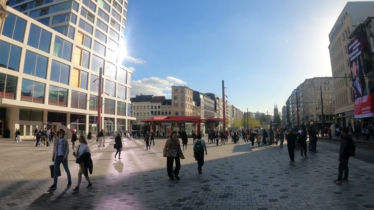PeopleWalking on the Street Between Concrete Buildings#StreetWalk #UrbanLife #CityPeople