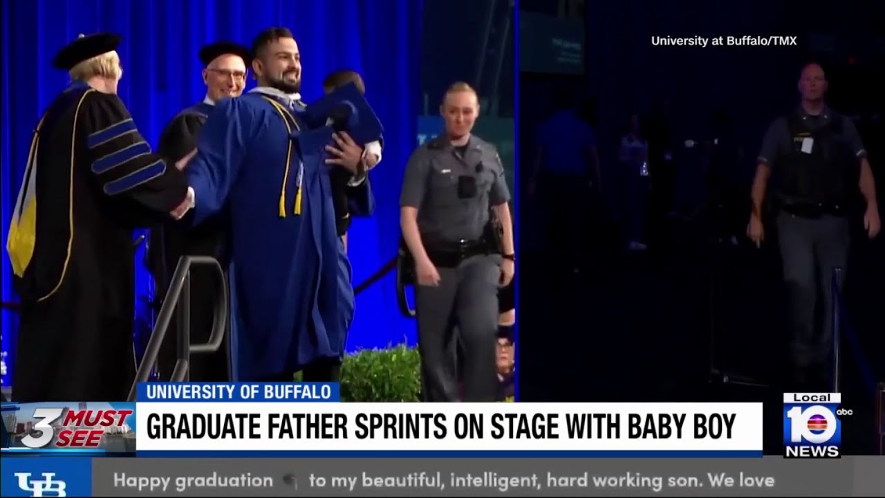 Video of father graduating while holding baby goes viral