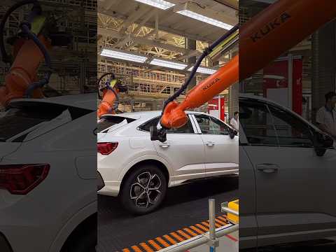 Kuka robotic arm detects gaps in new cars