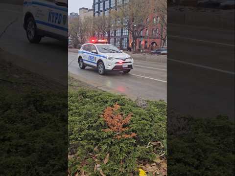 NYPD Traffic Enforcement Passing By On The West Side Highway In Manhattan, New York City