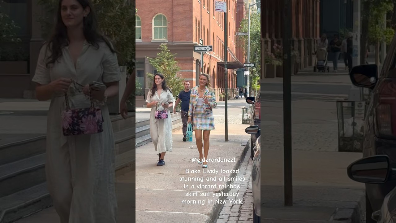 Blake Lively looked stunning and all smiles in a vibrant rainbow skirt suit yesterday morning in NYC