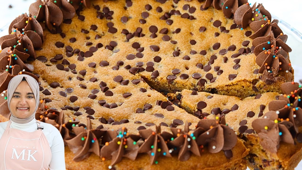The BEST EVER COOKIE CAKE recipe! Soft & gooey with crisp edges