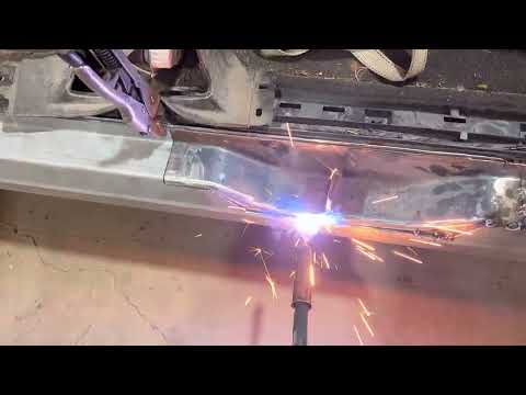 Little man welding rockers in