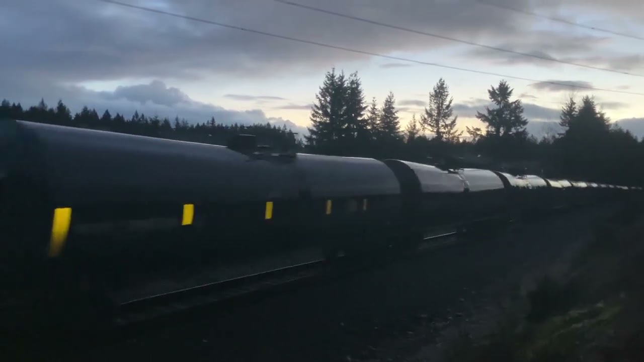 BNSF empty oil headed east in the late evening  with 448 axels 