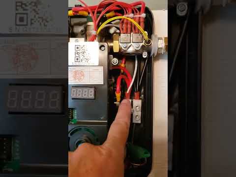Review of Rheem RETEX 13 Tankless water heater and how to install, remove cover, and wire.