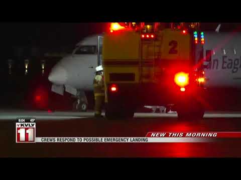 News Passengers vacate plane at Hector Airport in Fargo early Tuesday