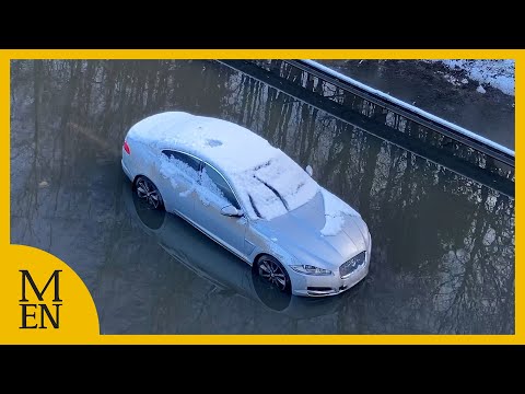 Cars STILL underwater on the closed A555 Manchester Airport Relief Road ...