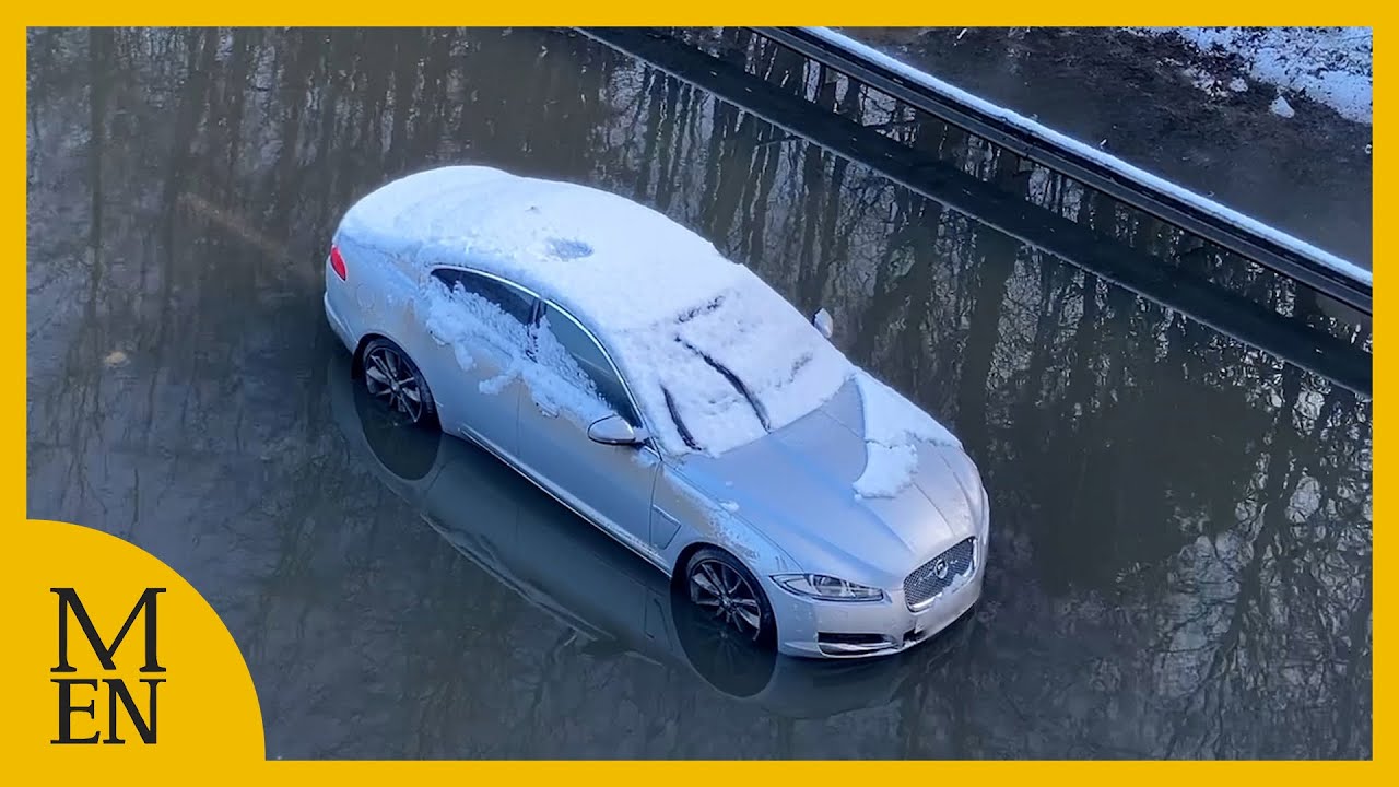 Cars STILL underwater on the closed A555 Manchester Airport Relief Road ...