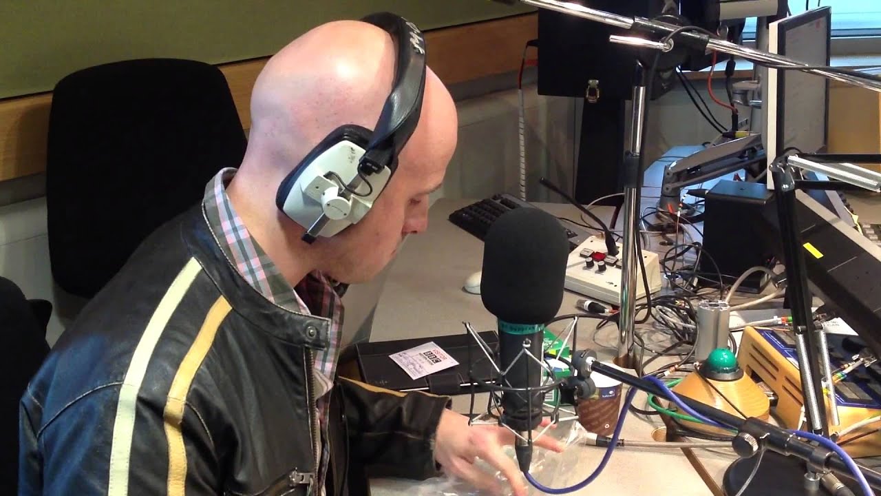 The Incredible Mr Goodwin: Straitjacketed TV daredevil dangles feet ...