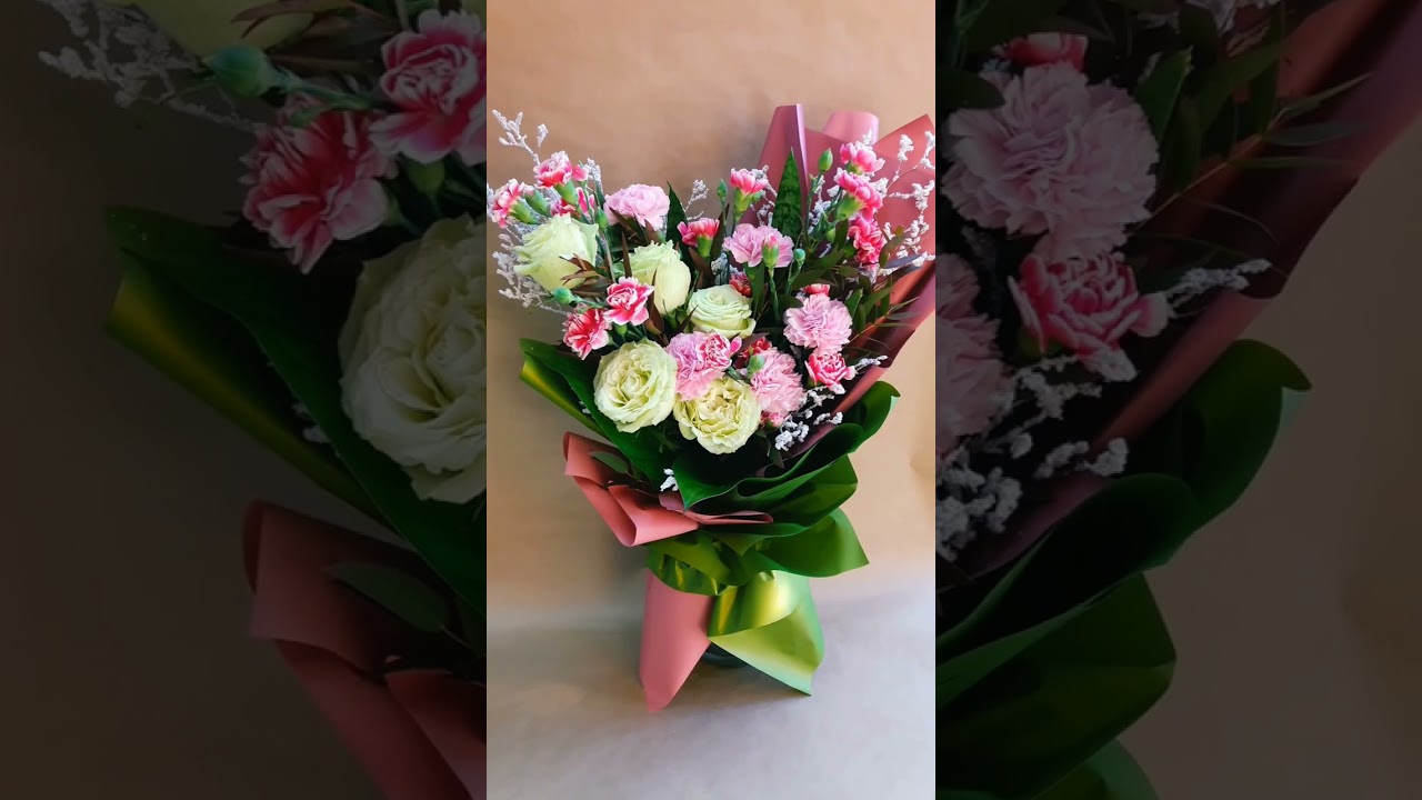 Flower arrangement with rose & carnation