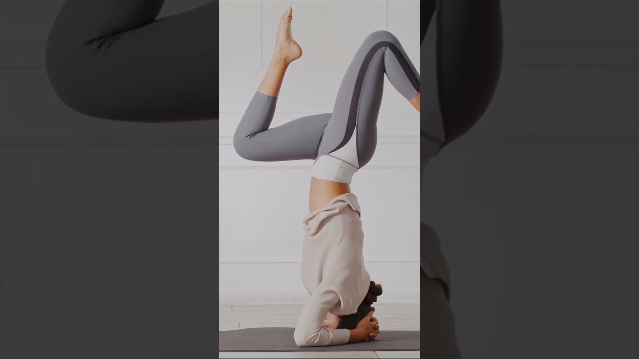 Side view of Asian woman shorts doing Yoga exercise stock videos