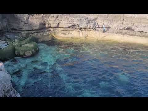 coastal rocks and sea by Portland Bill