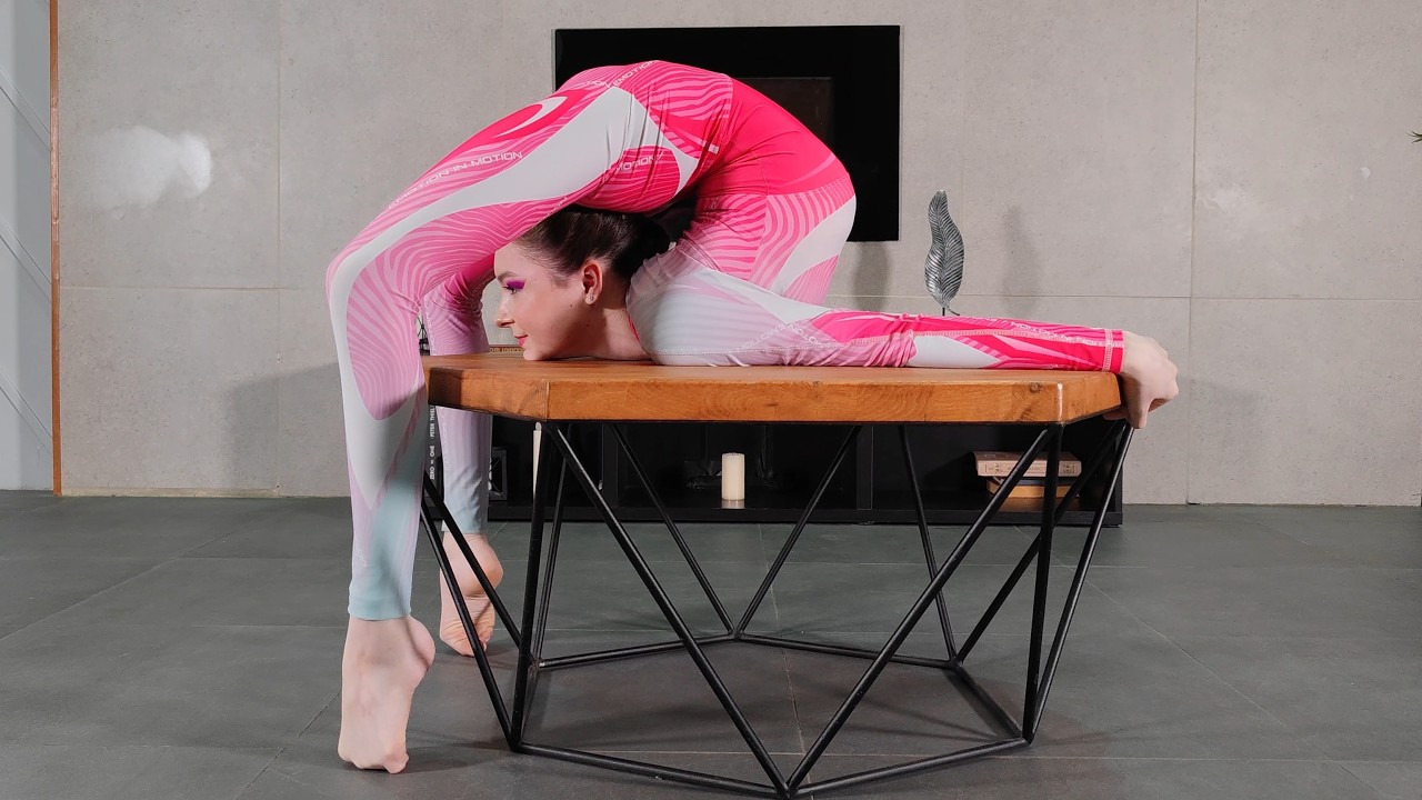 Circus Girl Vitta. Contortion Training in Pink Catsuit. Extreme Stretching. Flexibility. Flexshow.
