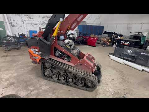 How to do an oil change on a Ditch Witch SK1550/SK1750
