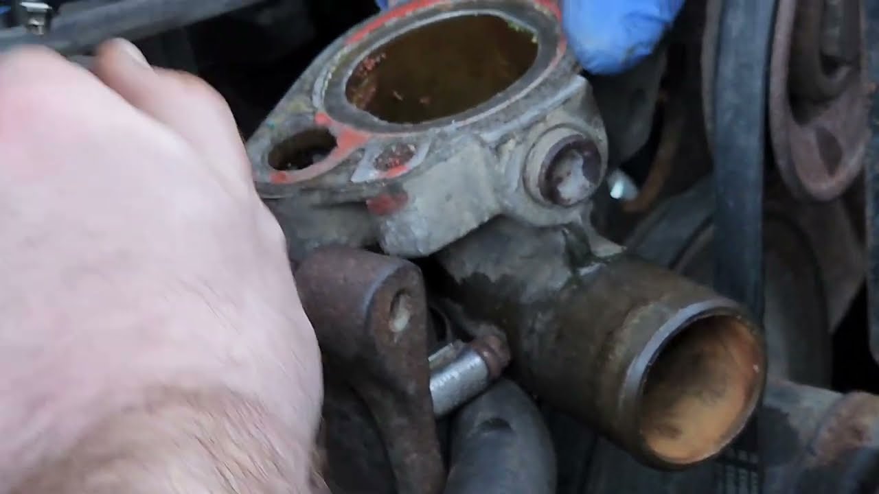 Replacing  radiator, thermostat, and thermostat housing on Collin's  Ford Truck.