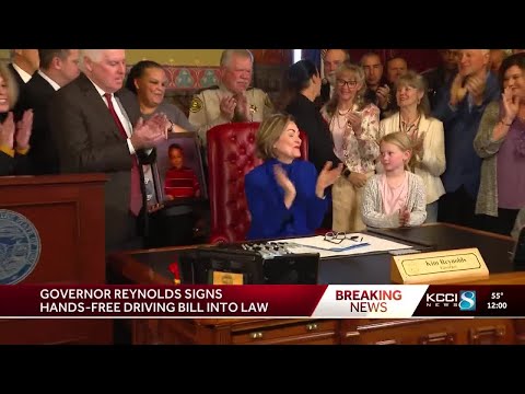 Iowa Gov. Kim Reynolds signs hands-free driving bill into law
