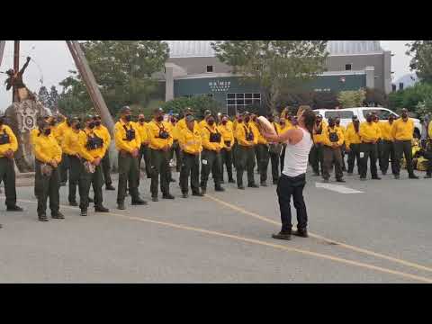 Mexican firefighters welcomed to Spirit Ridge with Syilx song