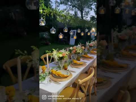 Dinner party table setup. Tablescape in the backyard.