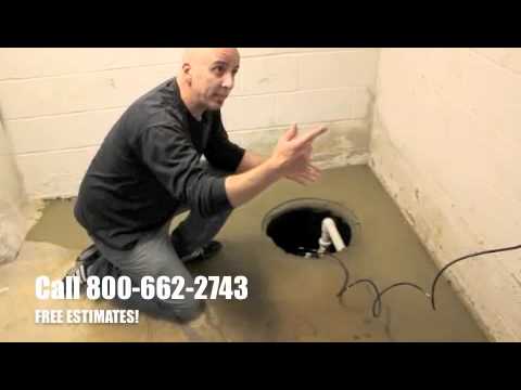 Arid Basement Waterproofing installing a French drain