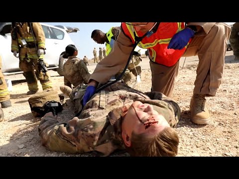 Airmen with the 332nd Air Expeditionary wing participate with Major Accident Response Exercise