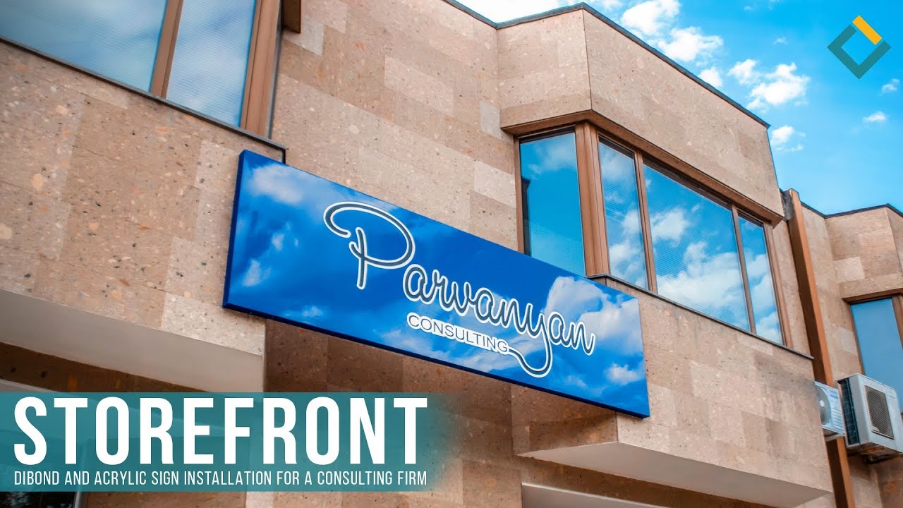 Storefront dibond and acrylic sign installation for a Consulting firm
