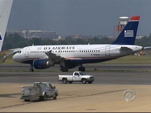 Feds sue to block US Airways, American Airlines merger