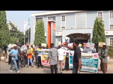 Mass Protesters Demand For Closing Down Of Guaranty Trust Bank.