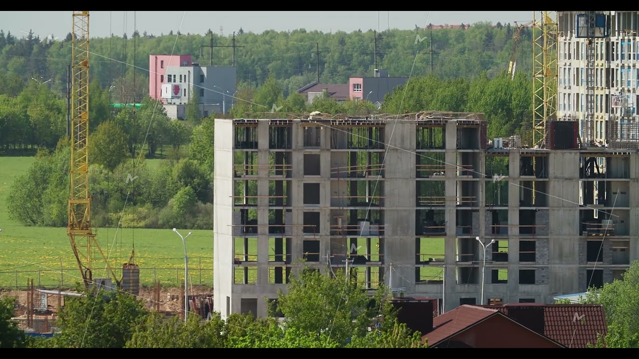 Crane At Work. Real Estate. Timelapse Construction And Development Of New Multi-storey Residential