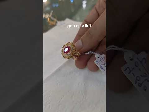 gold ring in 21carat gold v beautiful with ruby stone and white zarkon