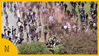 Chaotic new police footage shows mayhem that erupted across Manchester ...
