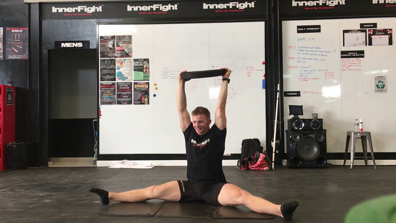 Seated straddle plate OH press