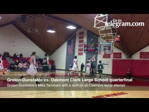 Groton-Dunstable's Mike Tammaro with a stuff on an Oakmont layup attempt in the 1st quarter