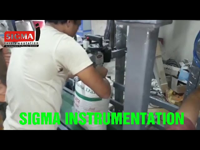 Semi Automatic Bagging Machine - SIGMA Sand Bag Packing machine ...