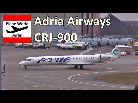 Adria Airways Bombardier CRJ900 *S5-AAU* landing at Berlin Tegel Airport in 2016