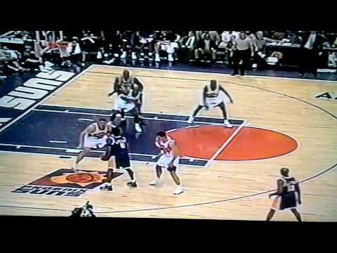 Kobe shoots over Joe Kleine in the paint for 2