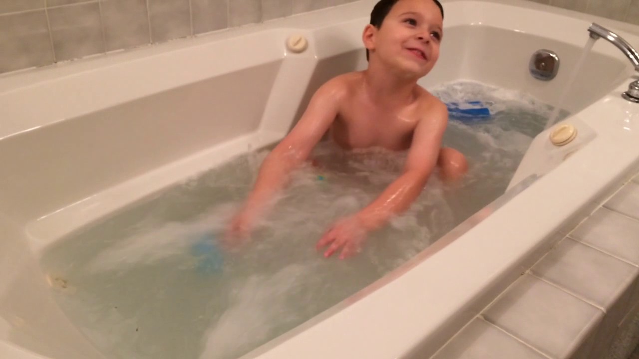 Caleb in the new bathtub