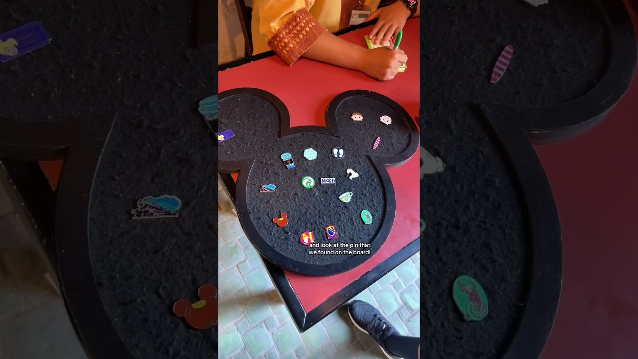 Found an INTERESTING Disney pin on the pin trading board…🤨