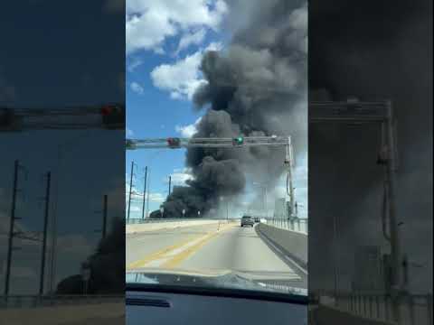 Dark plume of smoke billows from tractor-trailer fire near Tacony-Palmyra Bridge in Philadelphia