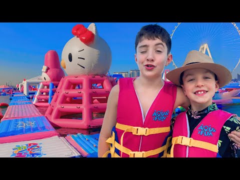Water Park Adventure for Kids 💦 World’s Largest Inflatable WaterPark ☀️ Family Fun
