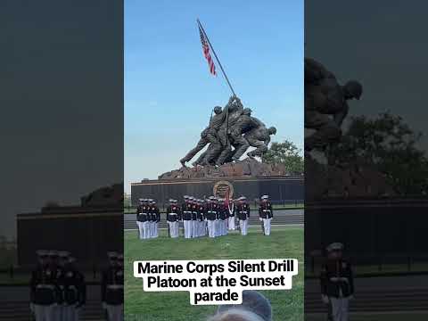 The Marine Corps Silent Drill Platoon performs at the Tuesday sunset parade at the war memorial