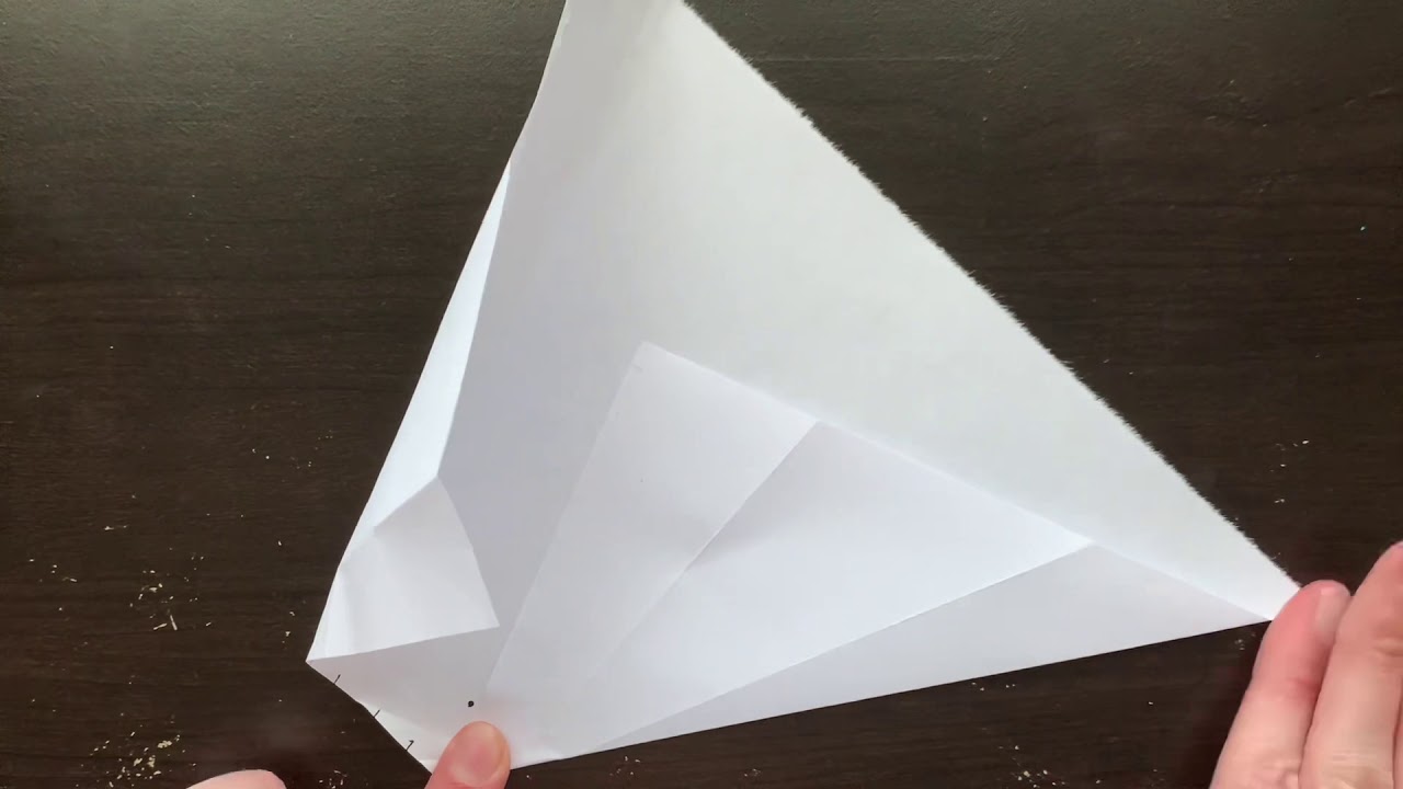 Folding paper to make a conic section