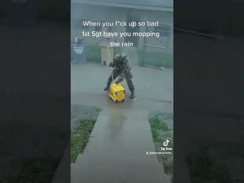 Soldier mops the rain #army #mop #mopping #rain
