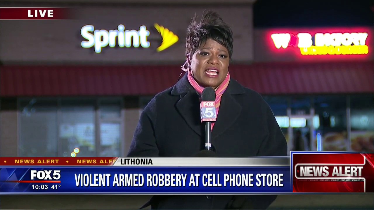 Violent armed robbery at cell phone store