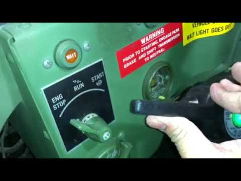 How to turn on the hazard lights of a Humvee.